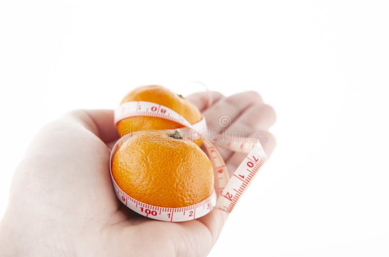 Mandarin in Hand Isolated on White Background. Stock Image - Image of ...