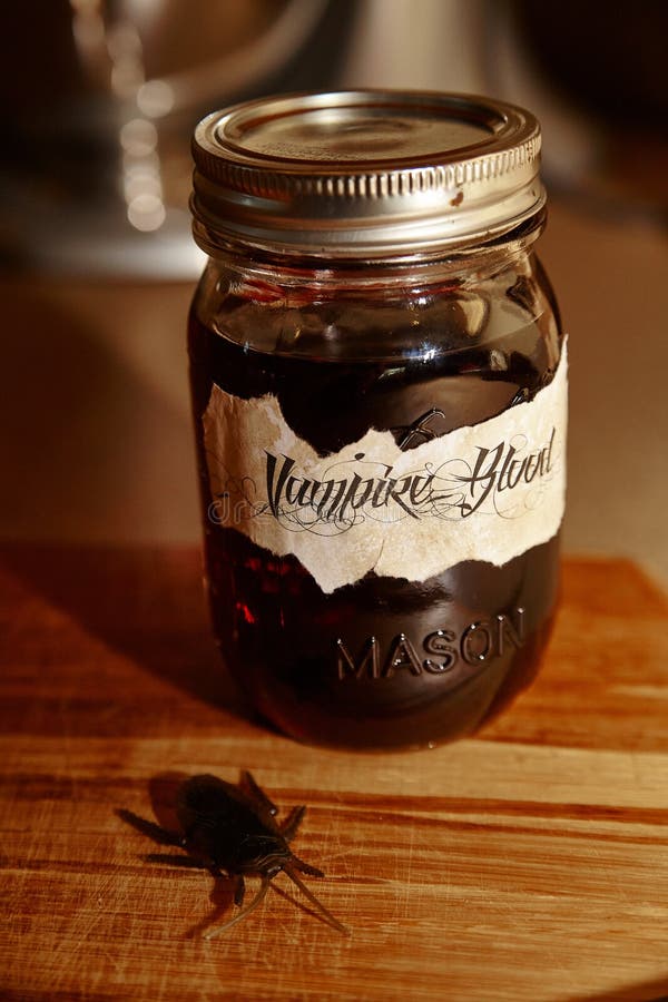 Mason Jar Labeled Vampire Blood in Victorian Script with a Bug on a ...