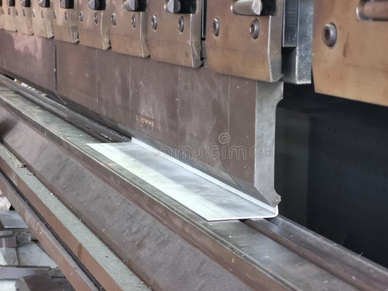 Image of a Metal Plate Bending with Industrial Machine. Stock Image ...