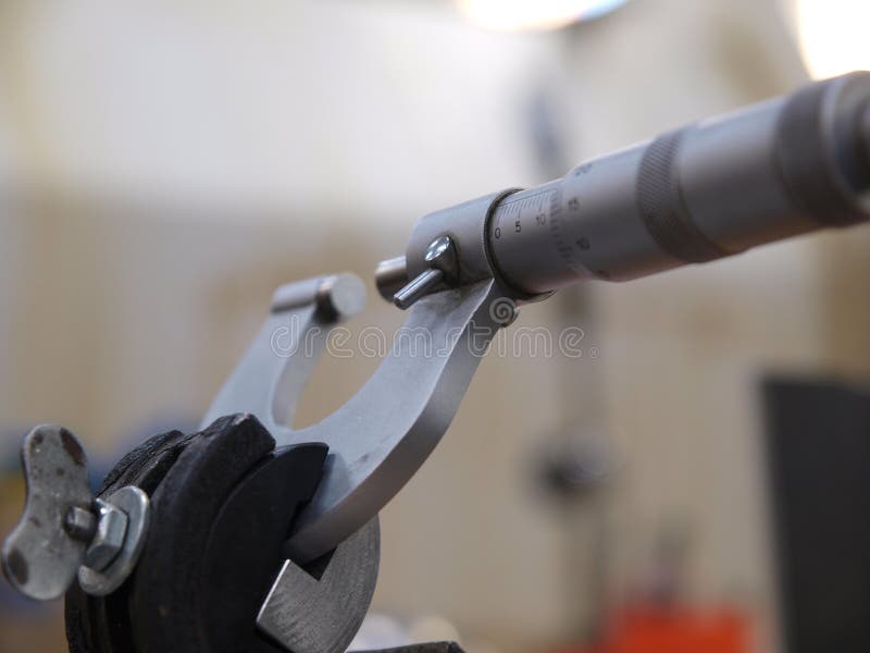 Image of a Metalworking Measuring Tool Mounted in a Rack. Micrometer ...