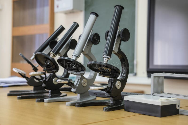 Microscopes on a School Desk Stock Photo - Image of microbiology, lens ...