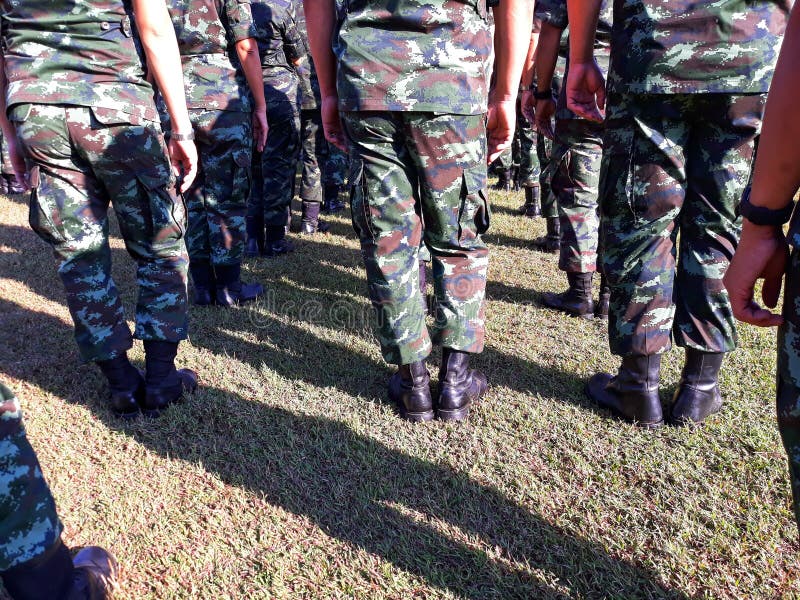 The Military Group, The Legs Of The Soldiers, Are Standing In Line And ...
