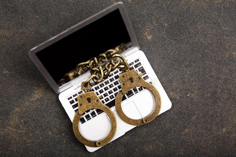 Image of Miniature Computer Handcuffs Stock Image - Image of cyber ...