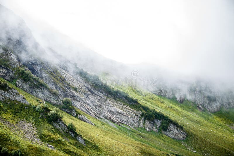 Image of Misty Hilly Terrain Stock Photo - Image of foggy, hilly: 111833138