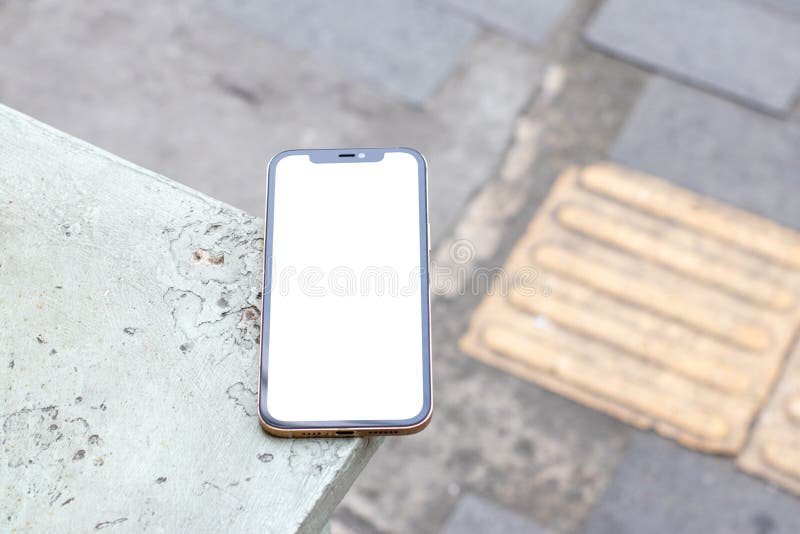 Mockup Image of a Mobile Phone with Blank White Screen on the Floor ...