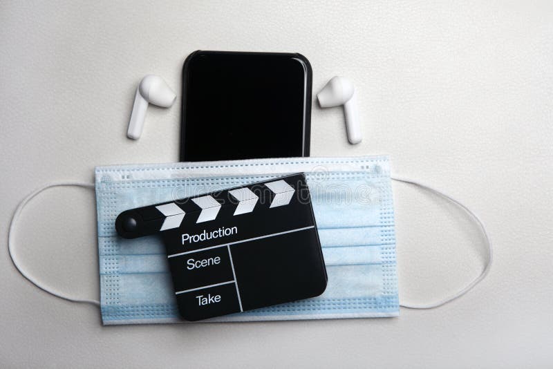 Image of Mobile Phone Mask Clapper Board Stock Photo - Image of home ...