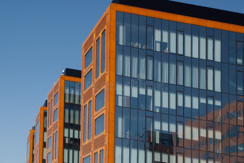 Image of Modern Yellow Office Buildings Against a Blue Sky Stock Image ...