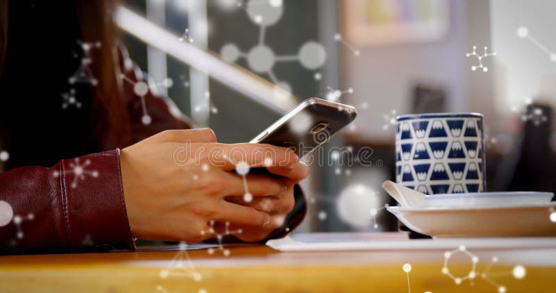 Image of Molecules Floating Over Hands of Caucsian Woman Using ...