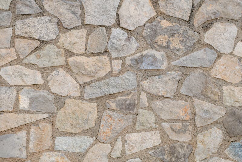 Stacked and Mortared Grey Stone and Flat Rock Wall Stock Image - Image ...