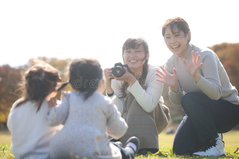 Mother Taking Pictures of Children Stock Image - Image of female, hobby ...
