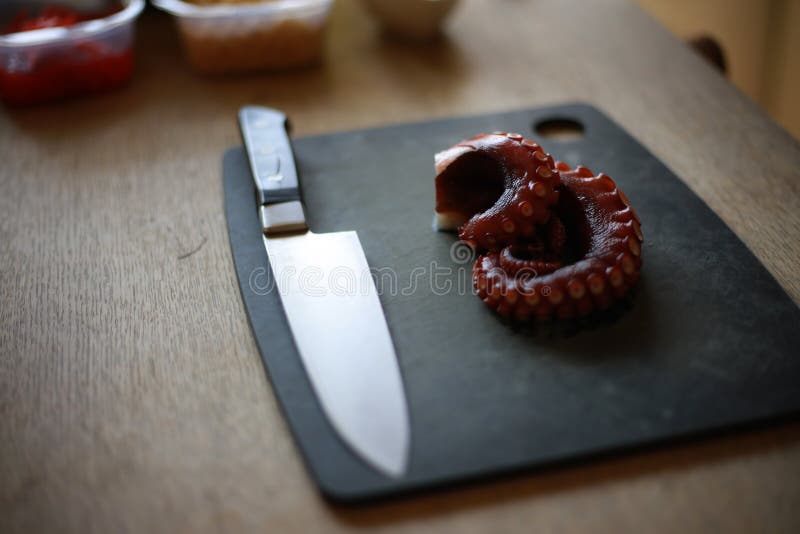Octopus during cooking stock image. Image of brown, meal - 241903753