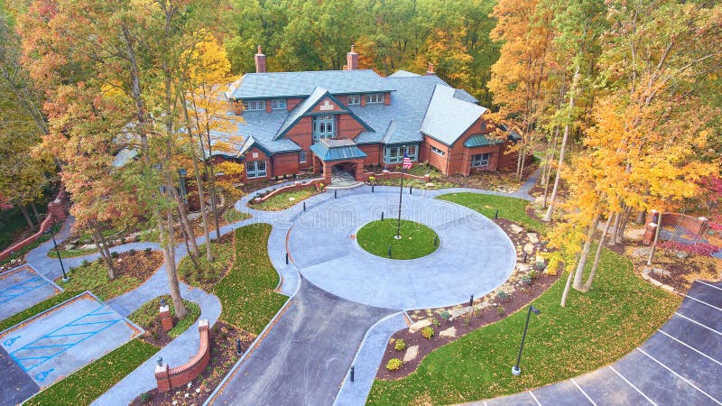 Office Architecture with Circle Driveway Surrounded by Fall Trees ...
