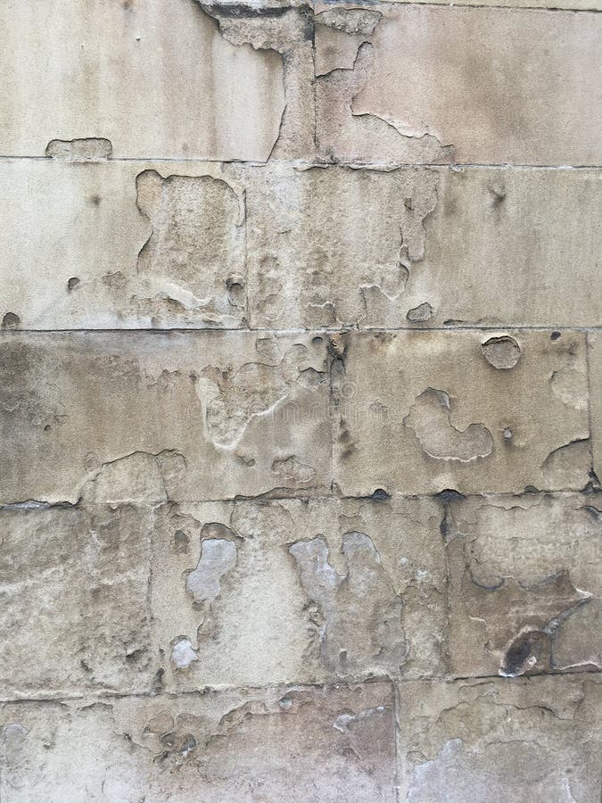 Deteriorated Wall with White, Blue and Red Holes and Stains Stock Image ...