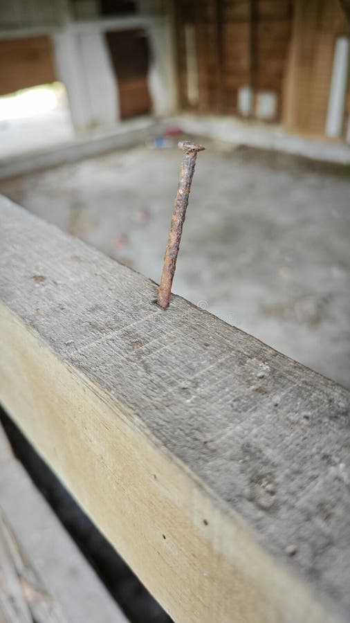 Old Rusty Nail on the Building Weathered Wood Texture. Stock Photo ...