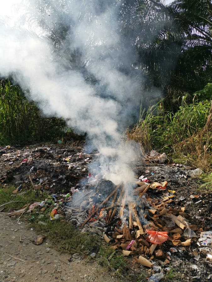 Open Rubbish Burning Along the Rural Roadside. Stock Image - Image of ...