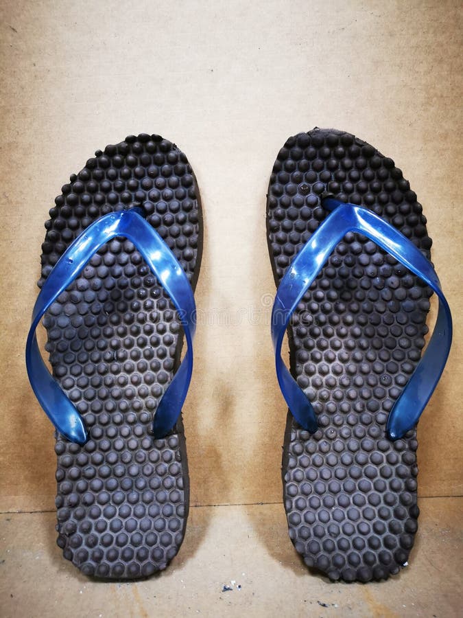 Image a Pair of Used Rubber Slipper. Stock Photo - Image of torn ...