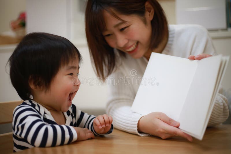 Parent and child reading stock image. Image of kindergarten - 241908575