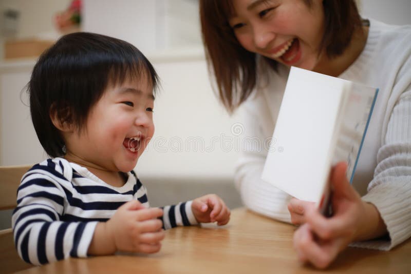 Parent and child reading stock image. Image of parents - 241908577