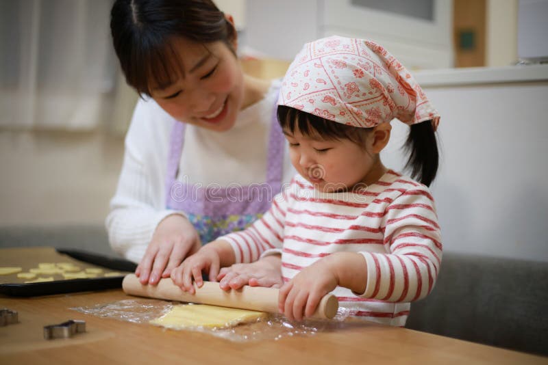 Parents and Children Making Sweets Stock Photo - Image of biscuits ...