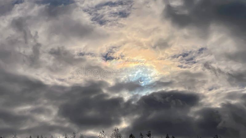 Image of a Partial Solar Eclipse through Veil Clouds Stock Image ...
