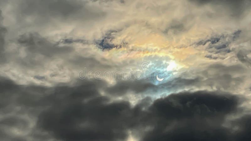 Image of a Partial Solar Eclipse through Veil Clouds Stock Photo ...