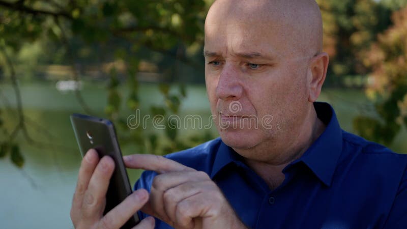 Image with a Person on the Street Sending a Message Using a Smartphone ...
