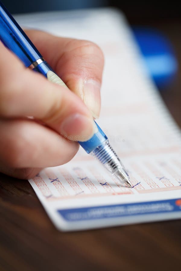 Image of Person Writing in Lottery Ticket Stock Photo - Image of loto ...