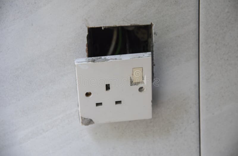 3-pin Plug Socket Adapter Hanging Out from the Wall Stock Image - Image ...