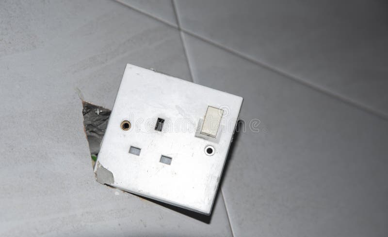 3-pin Plug Socket Adapter Hanging Out from the Wall Stock Image - Image ...