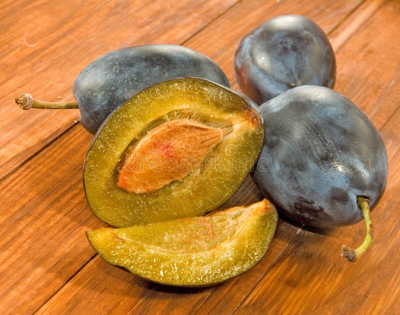 Image of Plum on the Plate Closeup Stock Photo - Image of front ...