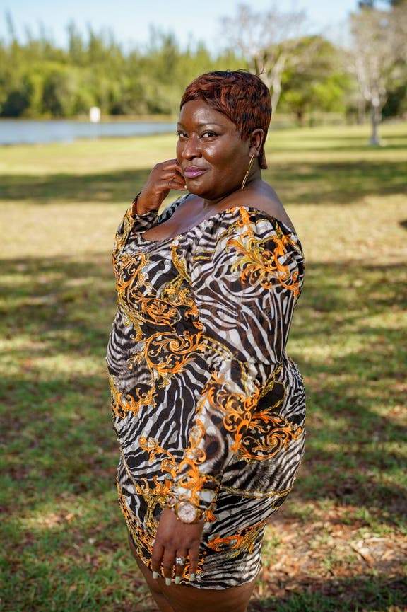 Image of a Plus Size Woman Posing Outdoors Stock Photo - Image of ...