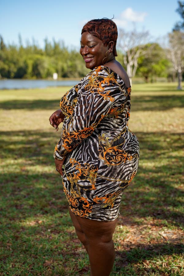 Image of a Plus Size Woman Posing Outdoors Stock Image - Image of woman ...