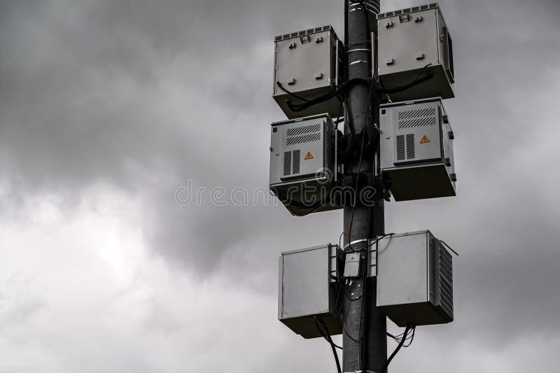 Telecommunication Base Station with a Cloudy Background and Urban ...