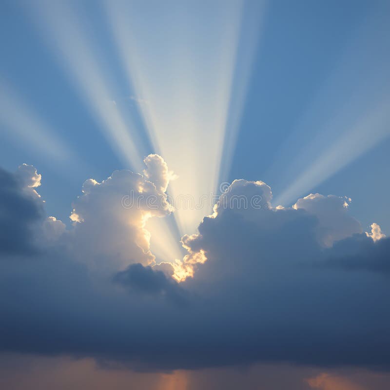 A Dramatic Sky with Rays of Sunlight Piercing through Gaps in the ...