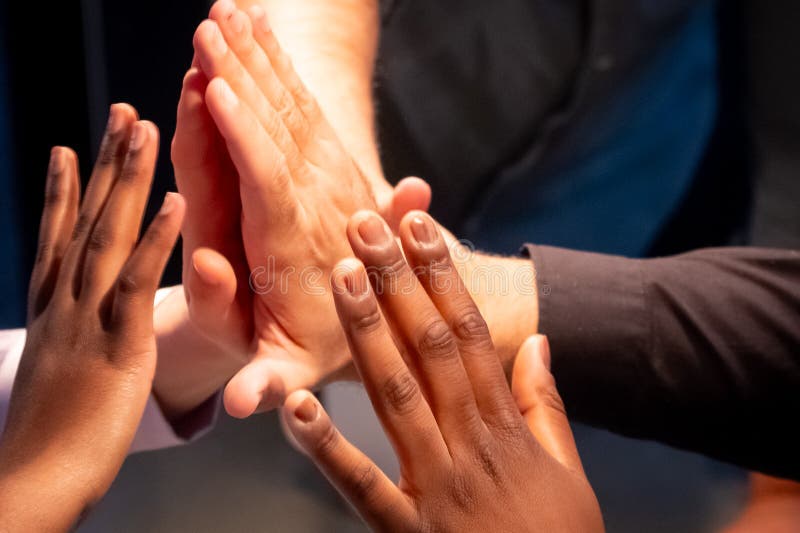 Team Unity High Five stock image. Image of action, hands - 310163029