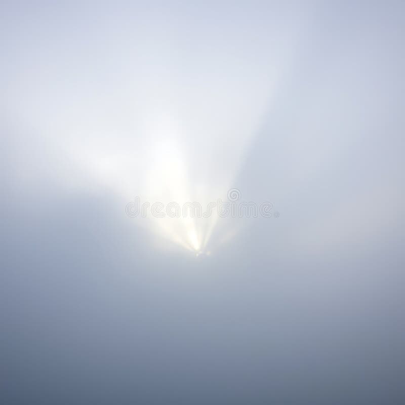 A Misty Sky with Thick Fog and Subtle Rays of Light Piercing through ...