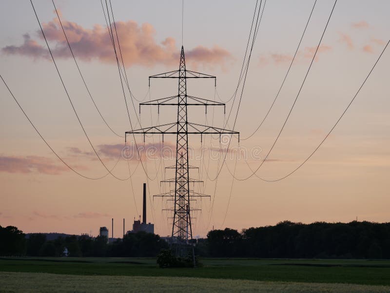 Image of Power Line during Sunset with Power Plant Stock Photo - Image ...
