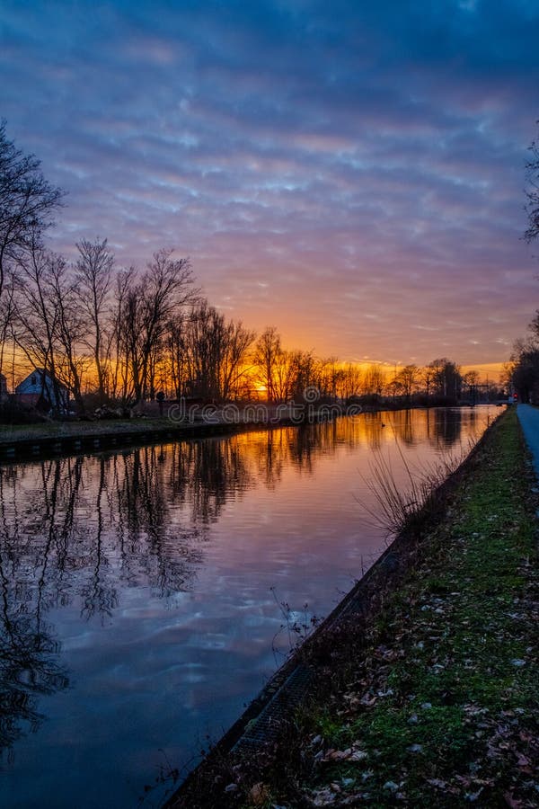 Vibrant Sunset Along the Riverside Stock Image - Image of dusk ...