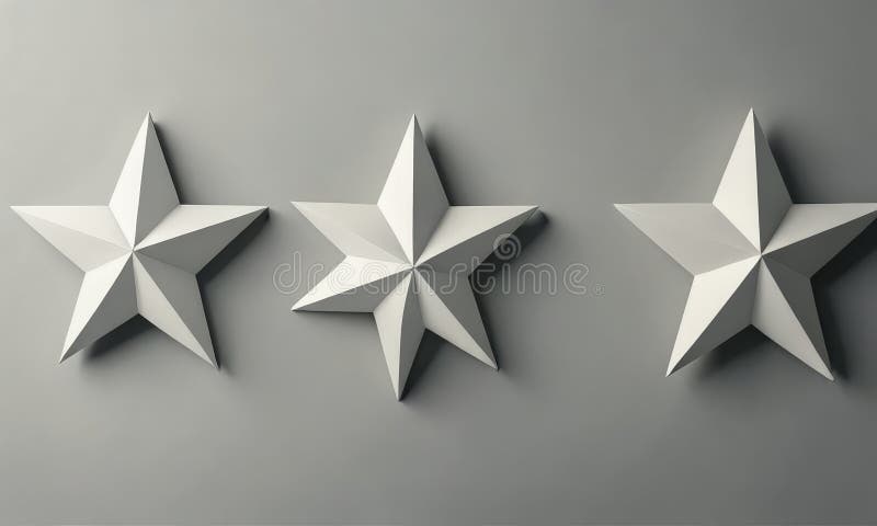 Three White Star-shaped Objects are Arranged in Row Against Gray ...