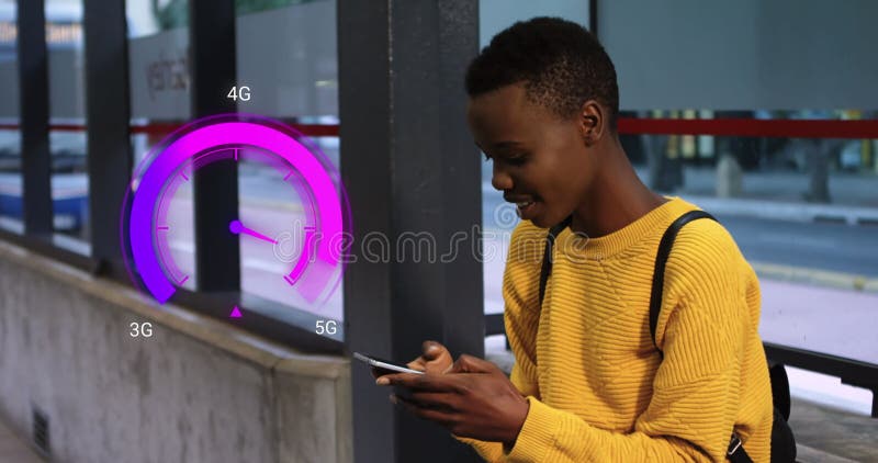 Image of Purple Speedometer Over Happy African American Boy Using ...