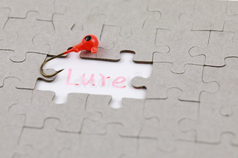 Image of Puzzle Piece with Lure and Fish Hook Stock Photo - Image of ...