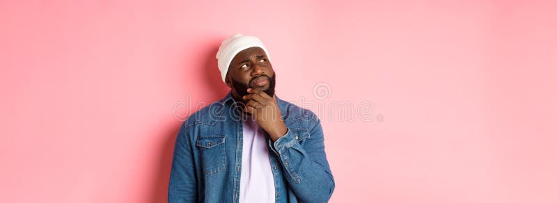 Image of Puzzled and Concerned Black Man, Staring at Upper Left Corner ...