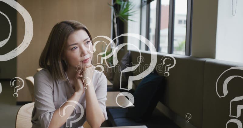 Image of Question Marks Over Asian Businesswoman Thinking Stock Photo ...