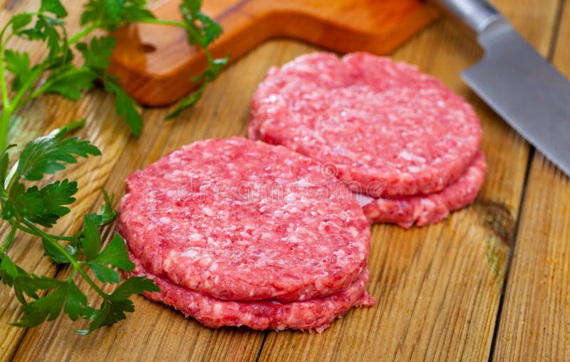 Image of Raw Burger Cutlet and Greens before Cooking, Stock Photo ...