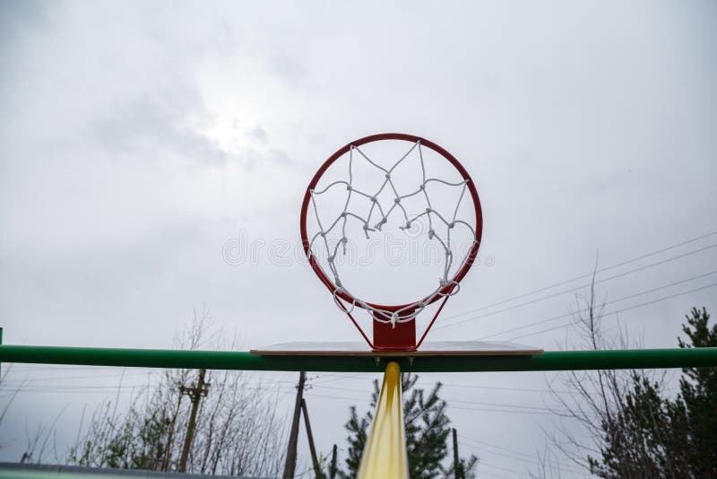 Image of Red Basketball Ring in Cloudy Day in the Summer Stock Image ...