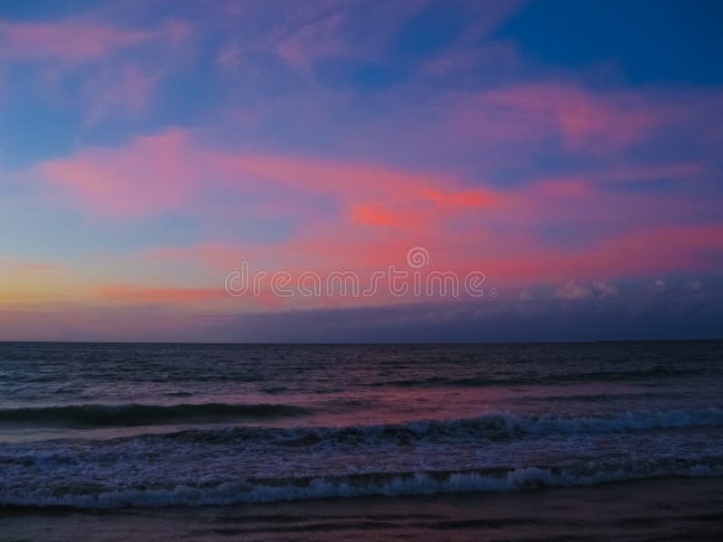 Image of the Sun Setting Over the Ocean Stock Photo - Image of nature ...