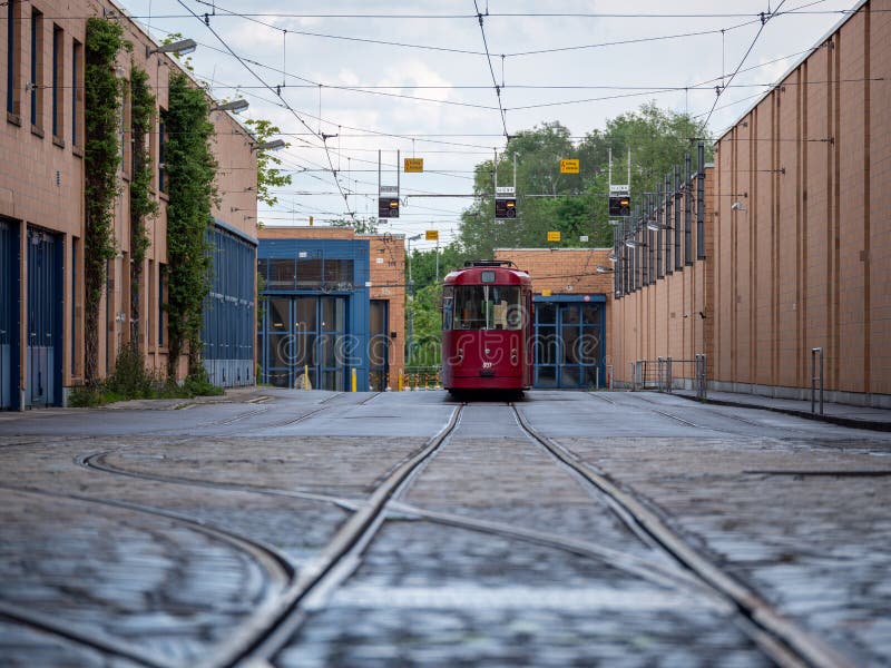 Image of Red Tram in Urban Environment Editorial Stock Photo - Image of ...