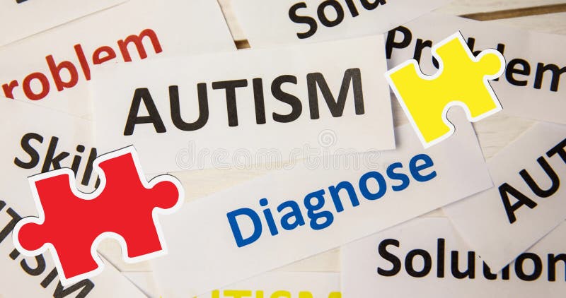 Image of Red and Yellow Puzzle Pieces Falling Over Autism Text on White ...
