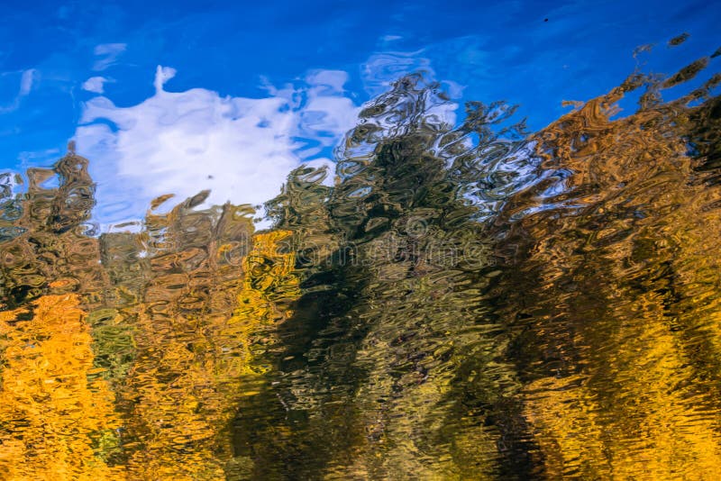 Image of the Reflection of Autumn Trees in the Water Stock Photo ...