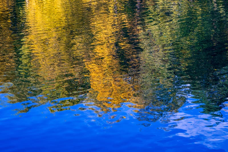 Image of the Reflection of Autumn Trees in the Water Stock Photo ...